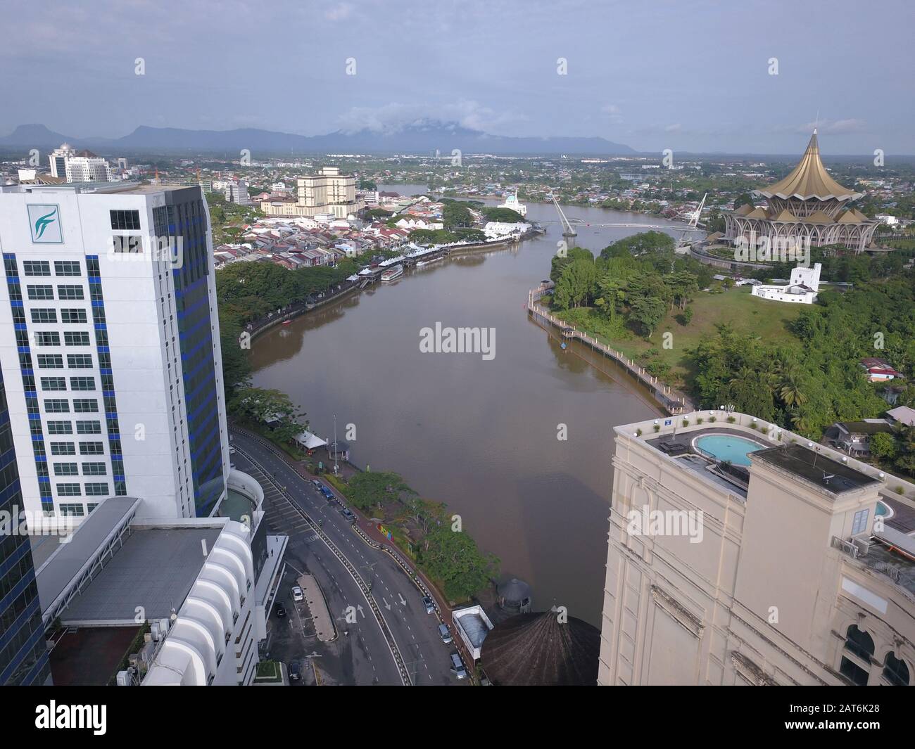 Aerial view of the Kuching city area, with the rivers, bridges, hills ...
