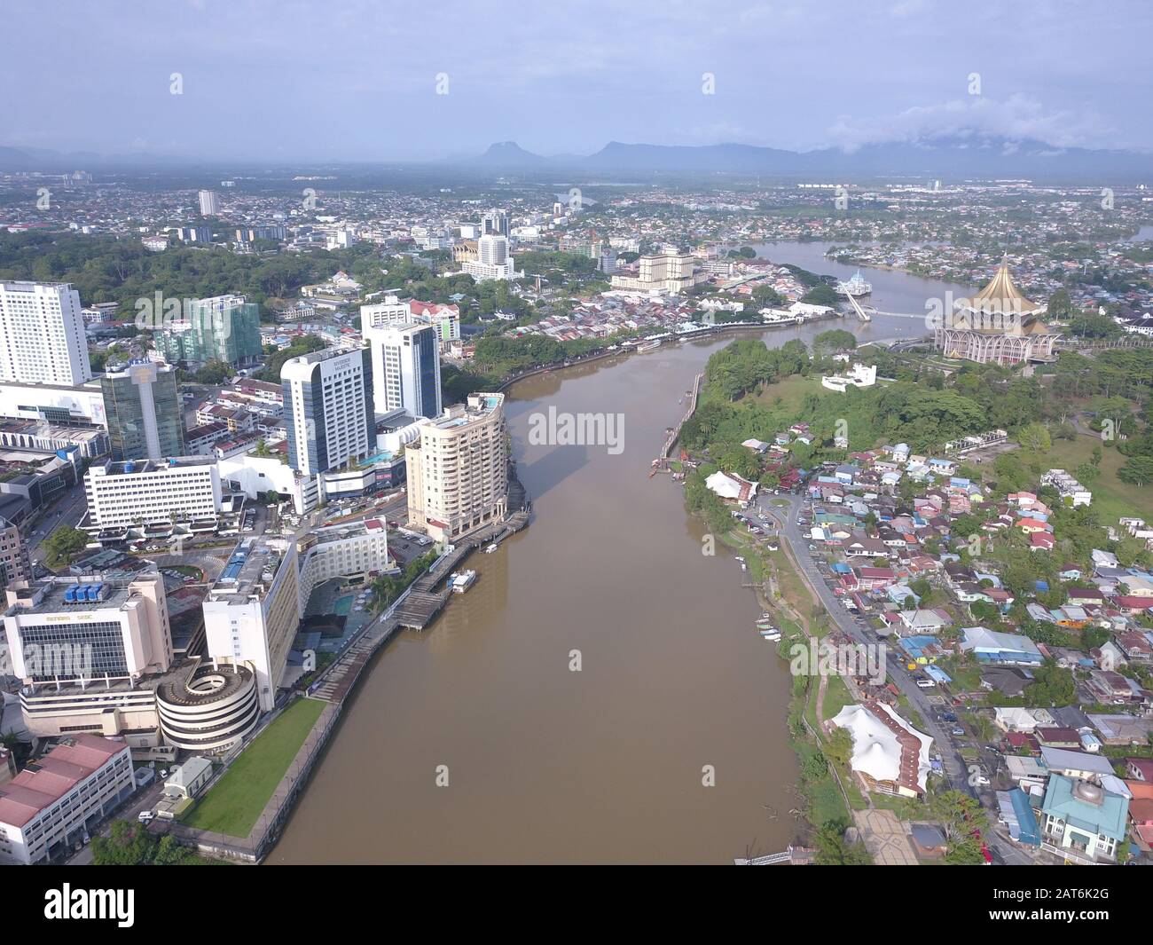 Aerial view of the Kuching city area, with the rivers, bridges, hills ...