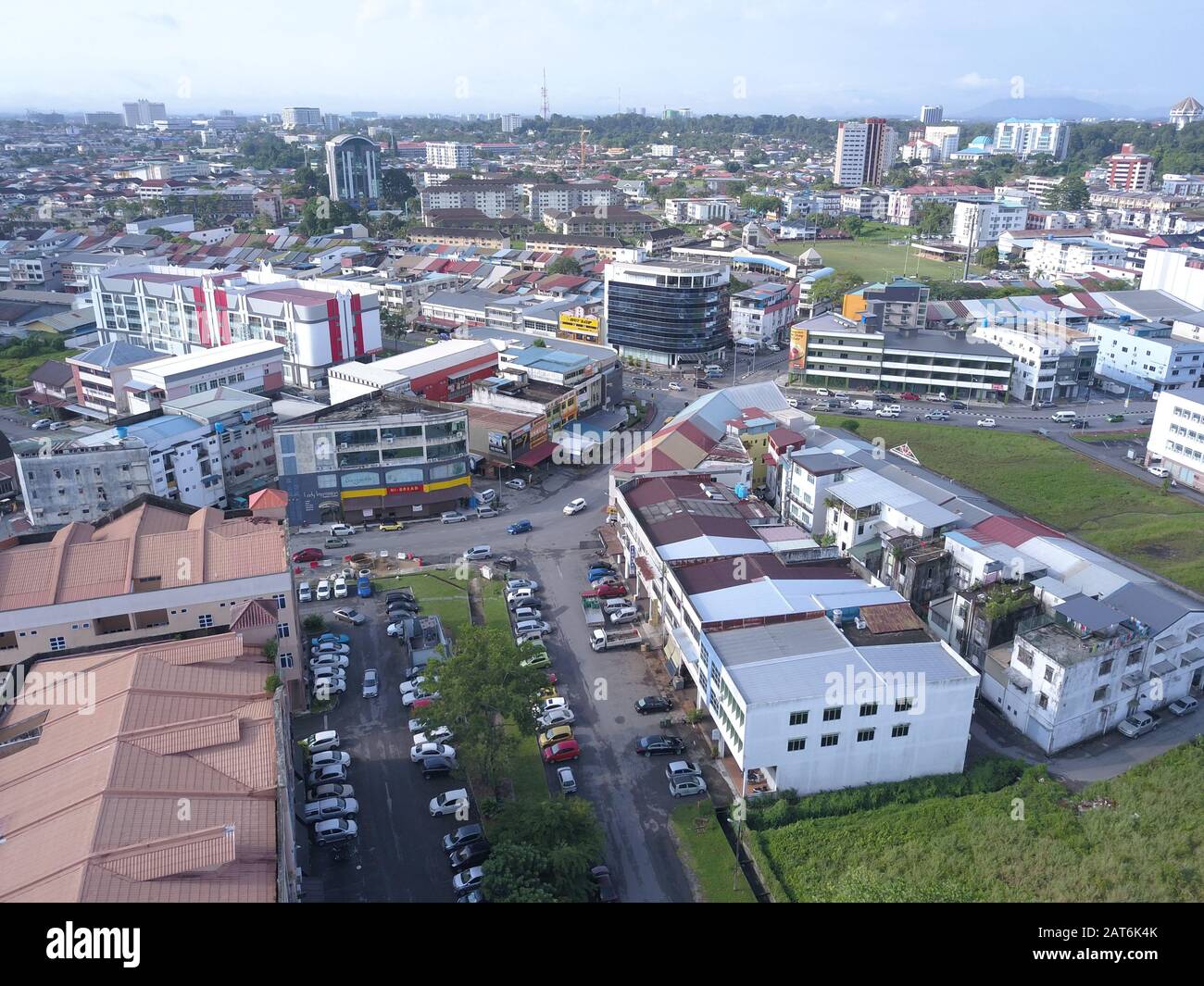 Aerial view of the Kuching city area, with the rivers, bridges, hills ...