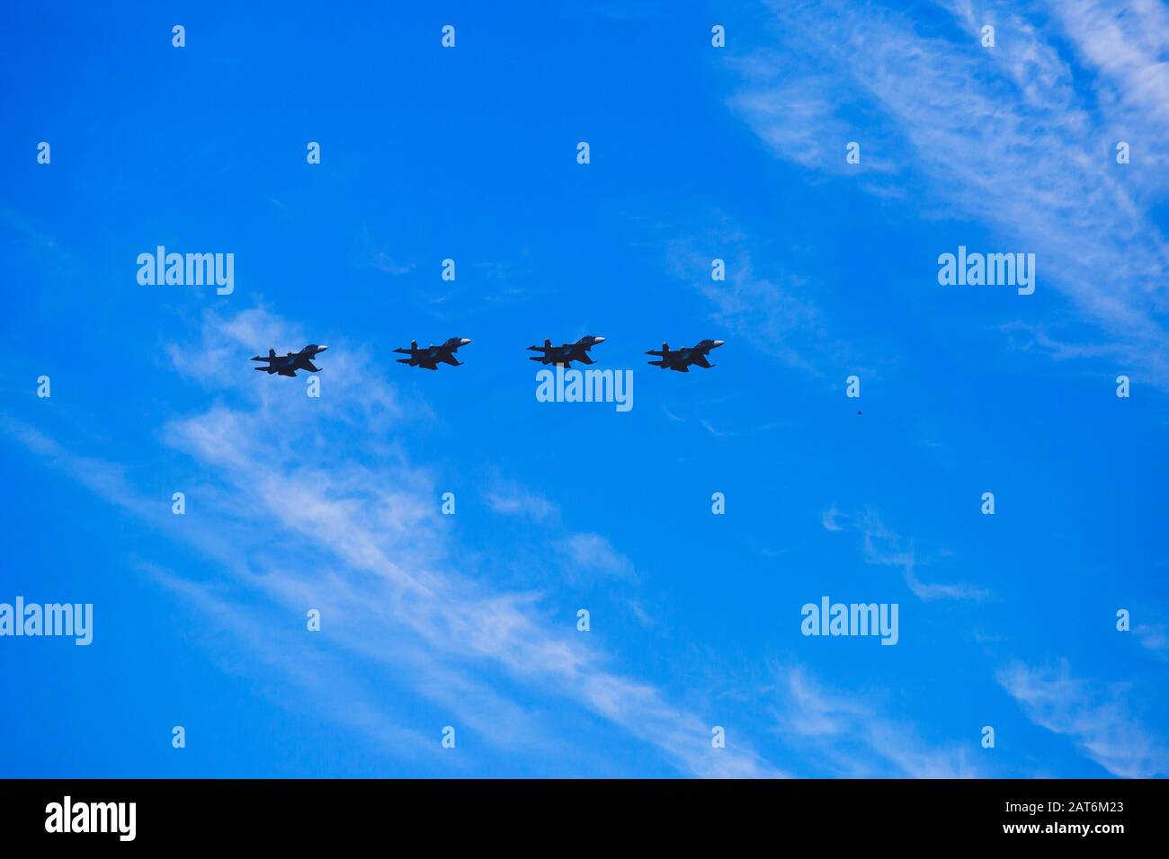 A squadron formation of russian attack aircrafts in the air, russian ...