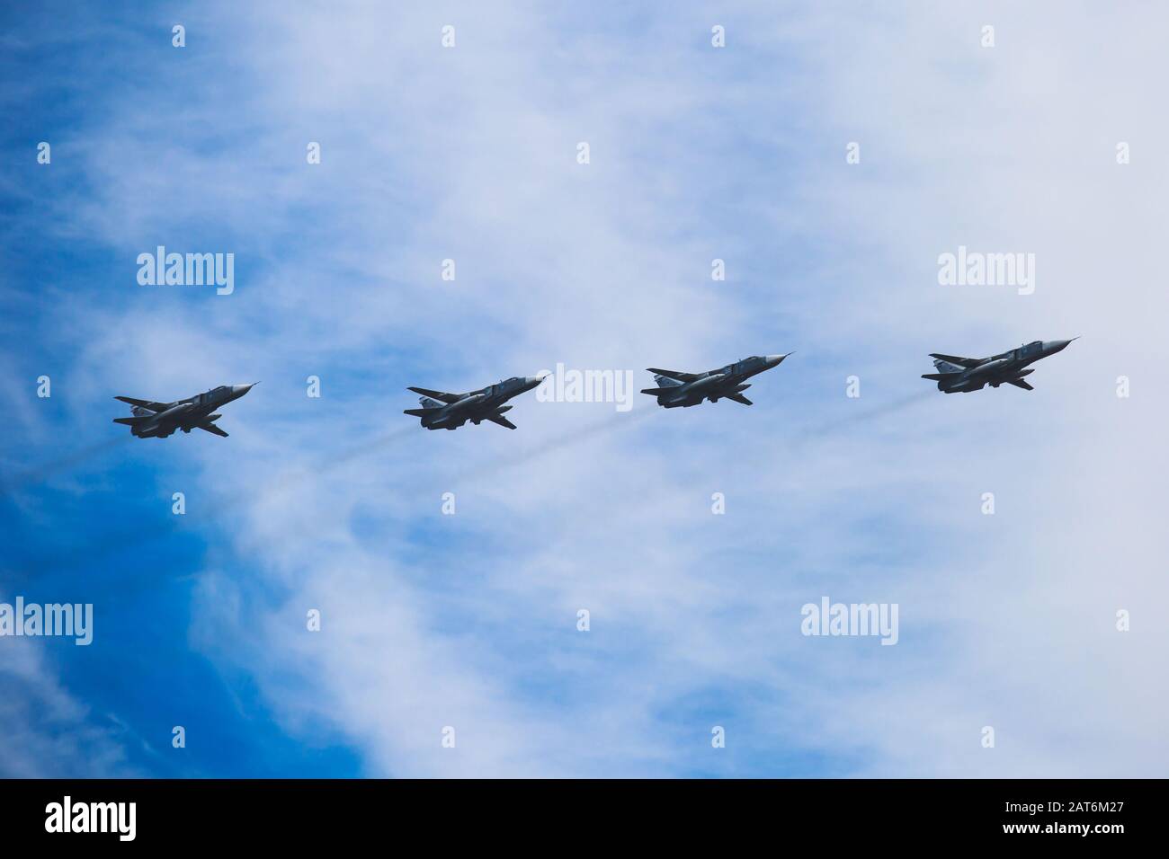 A squadron formation of russian attack aircrafts in the air, russian ...