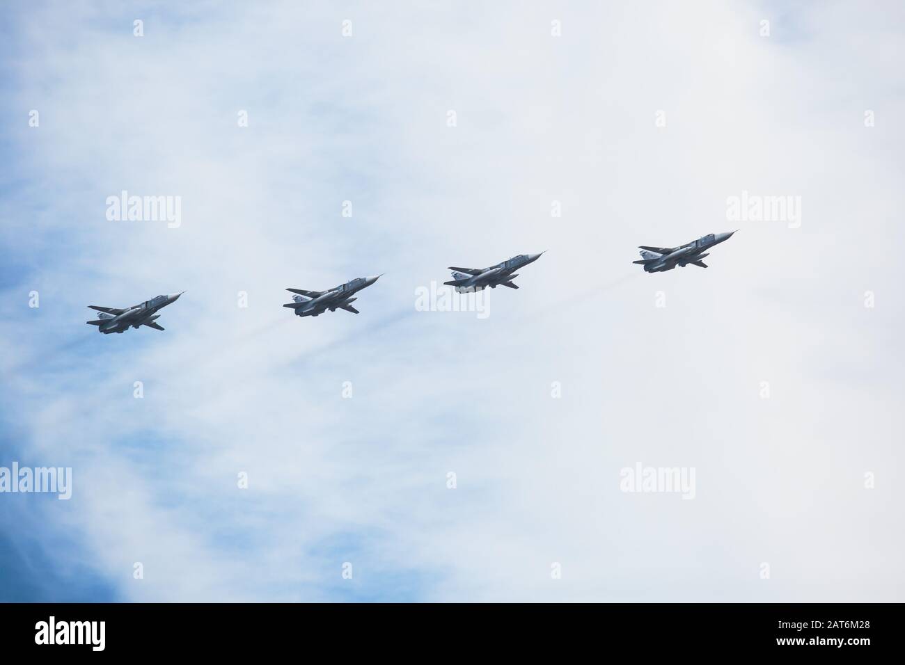 A squadron formation of russian attack aircrafts in the air, russian ...
