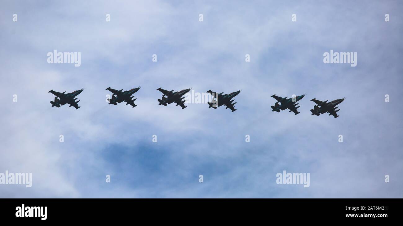 A squadron formation of russian attack aircrafts in the air, russian ...