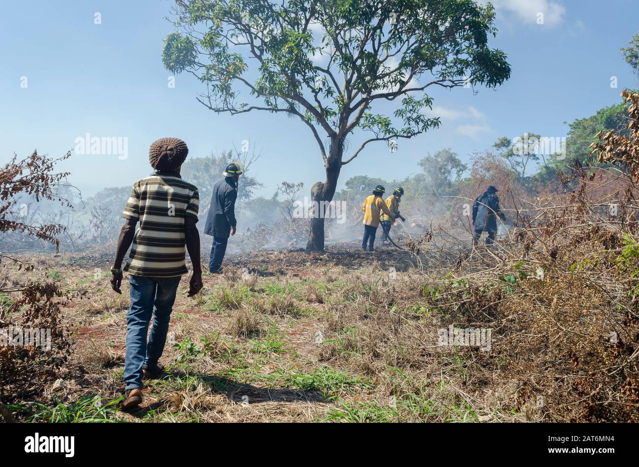 Man fire extinguishing hi-res stock photography and images - Alamy