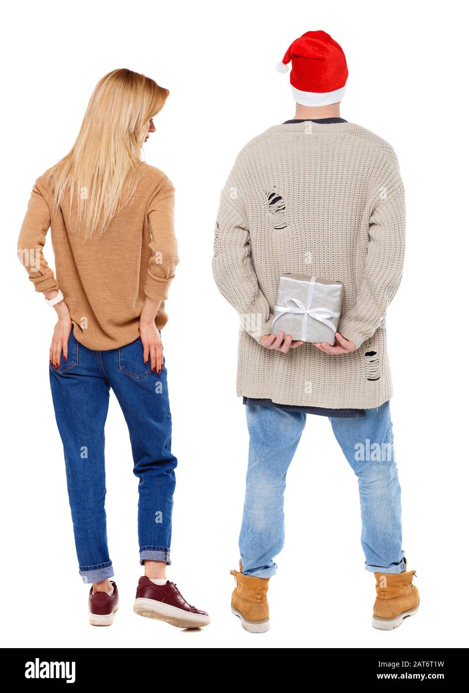 Back view of couple in sweater. beautiful friendly girl and guy ...
