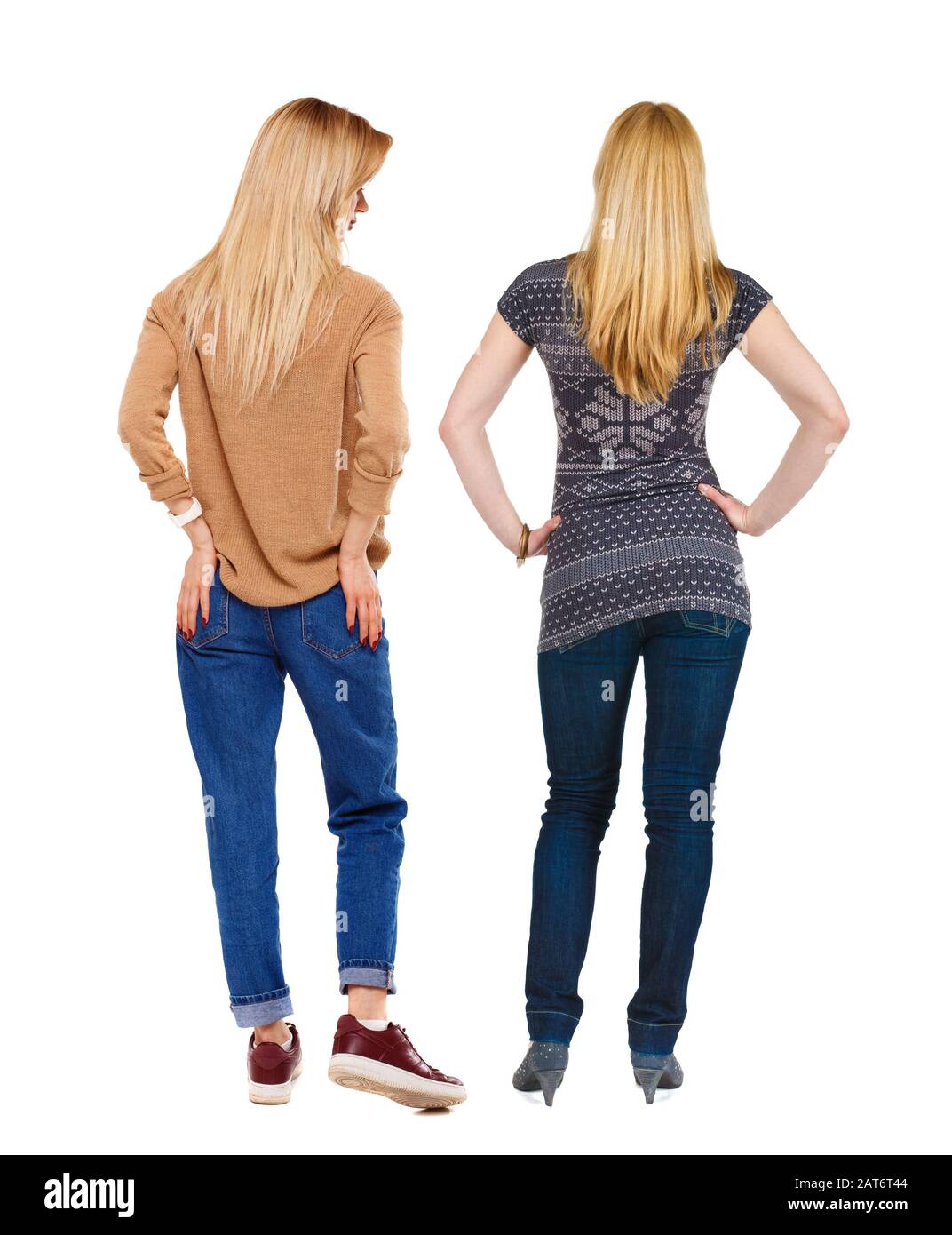 Back view of two woman in sweater. beautiful friendly girl and guy ...