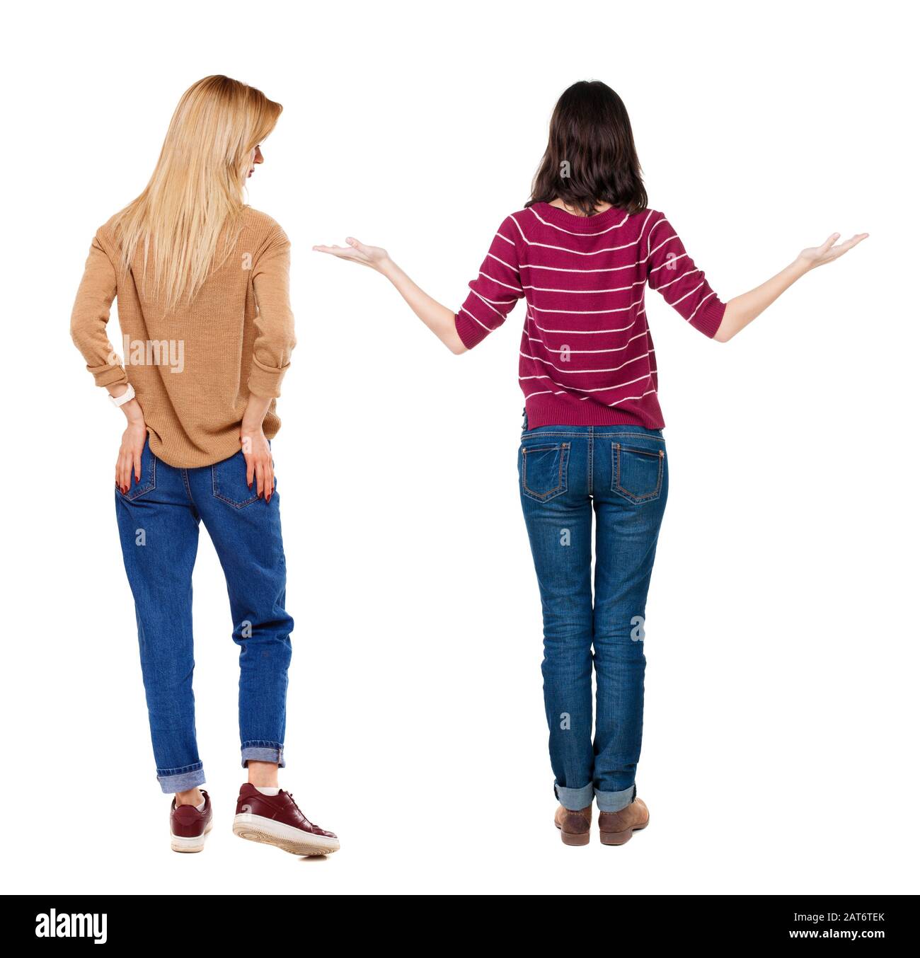 Back view of two woman in sweater. beautiful friendly girl and guy ...