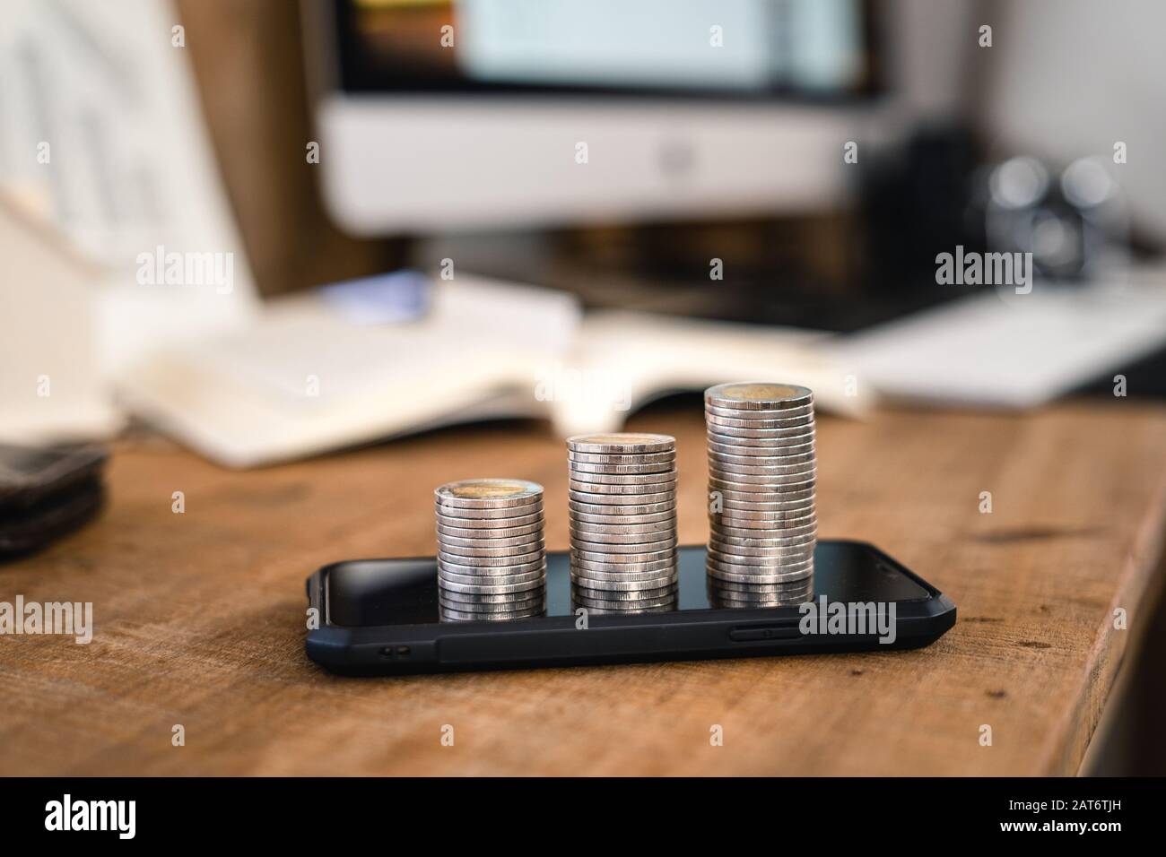 Money growing concept-Money and income graph drawing On Home office ...