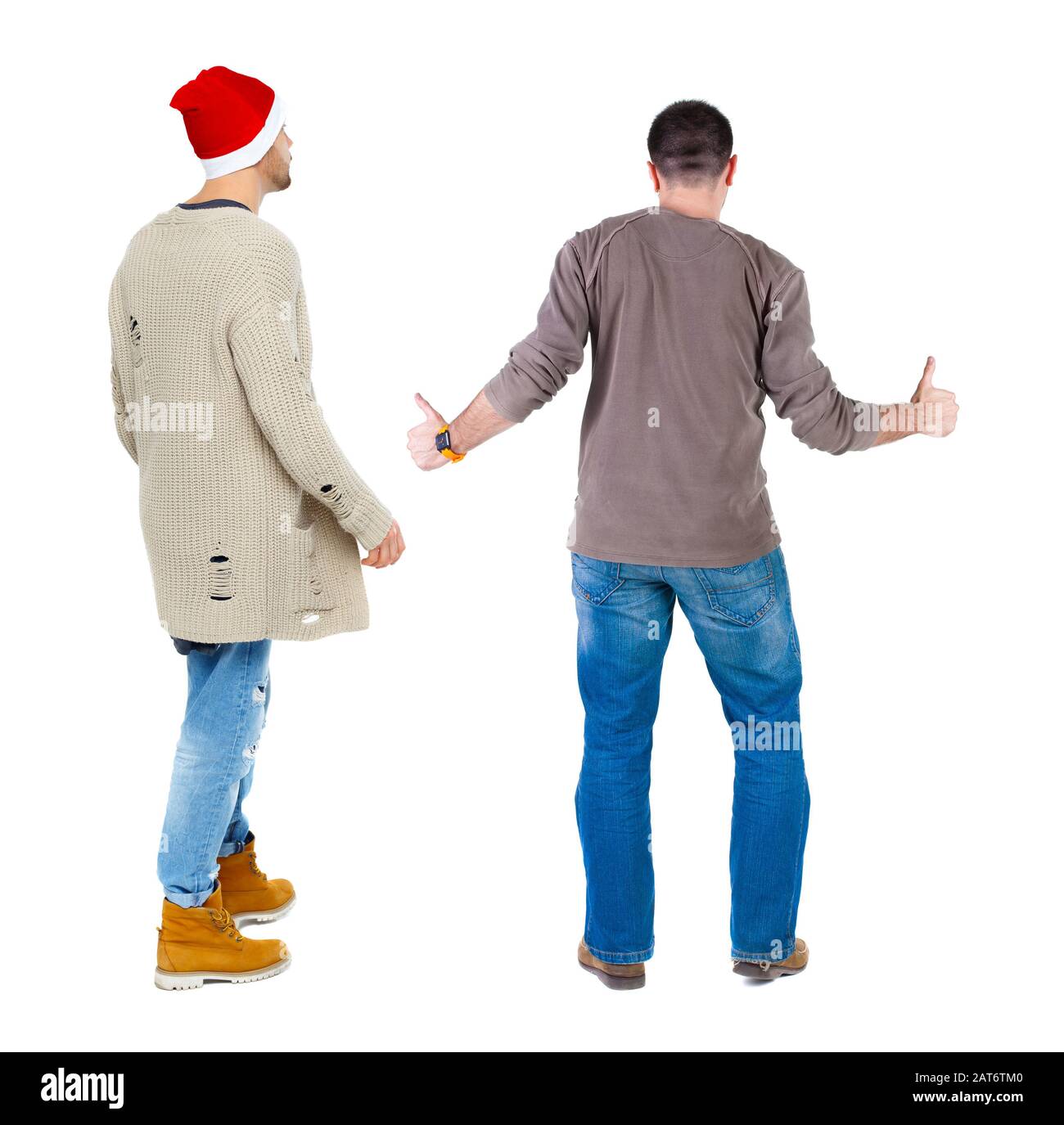 Back view of two man in sweater showing thumb up. Rear view people ...