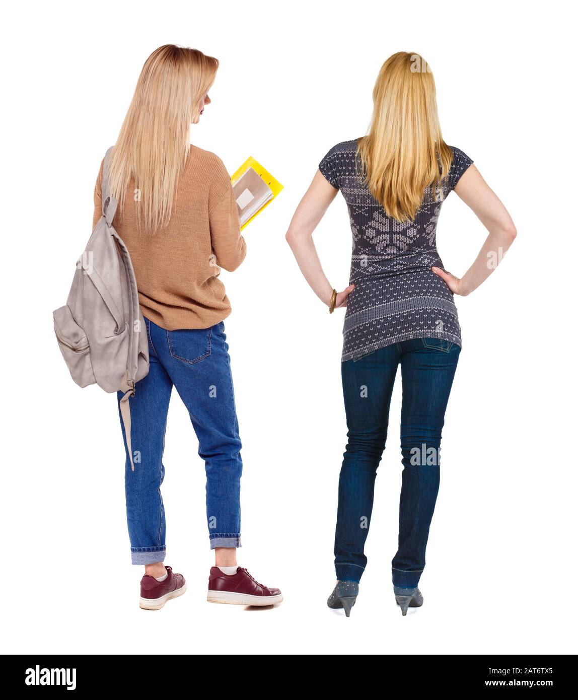 Back view of two woman in sweater. beautiful friendly girl and guy ...