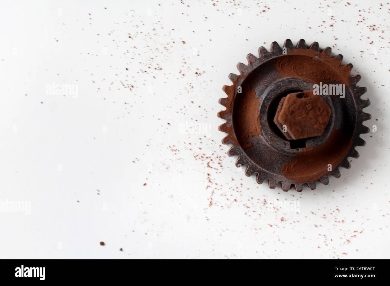 Rusty bolt, nut and gear wheel made of chocolate isolated on white ...