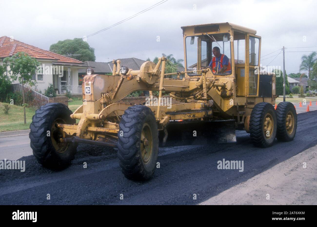 ROAD RESURFACING IN PROGRESS, SUBURBAN SYDNEY, AUSTRALIA Stock Photo ...