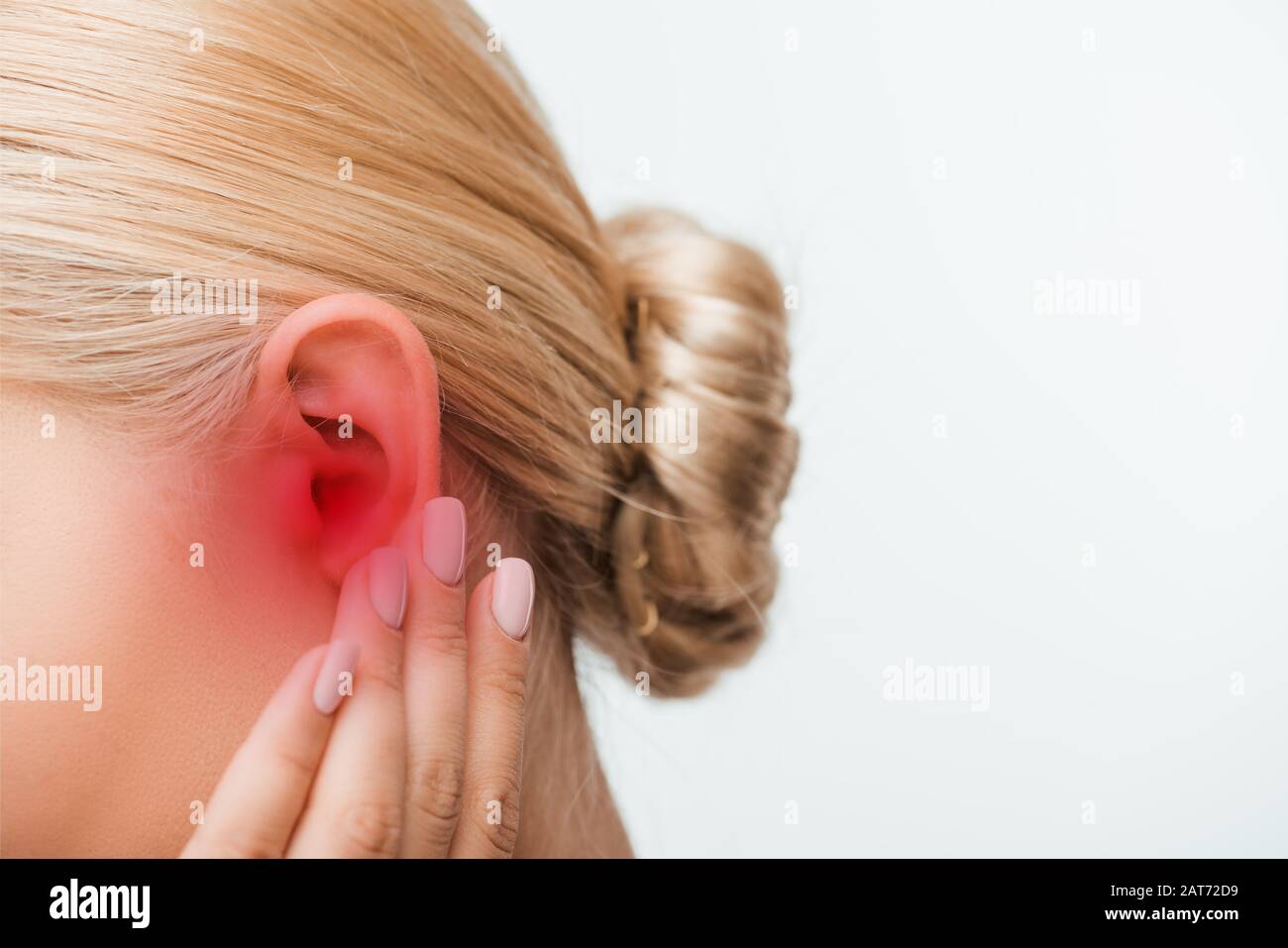 cropped view of blonde woman touching inflamed ear isolated on white ...