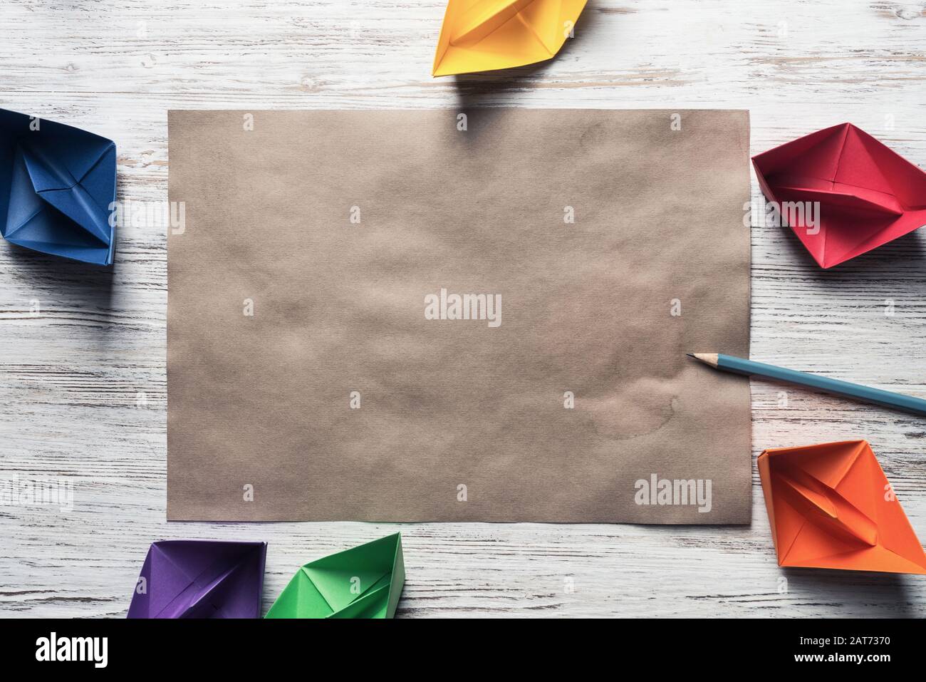 Concept of inspiration and creativity with paper ships. Place your text ...