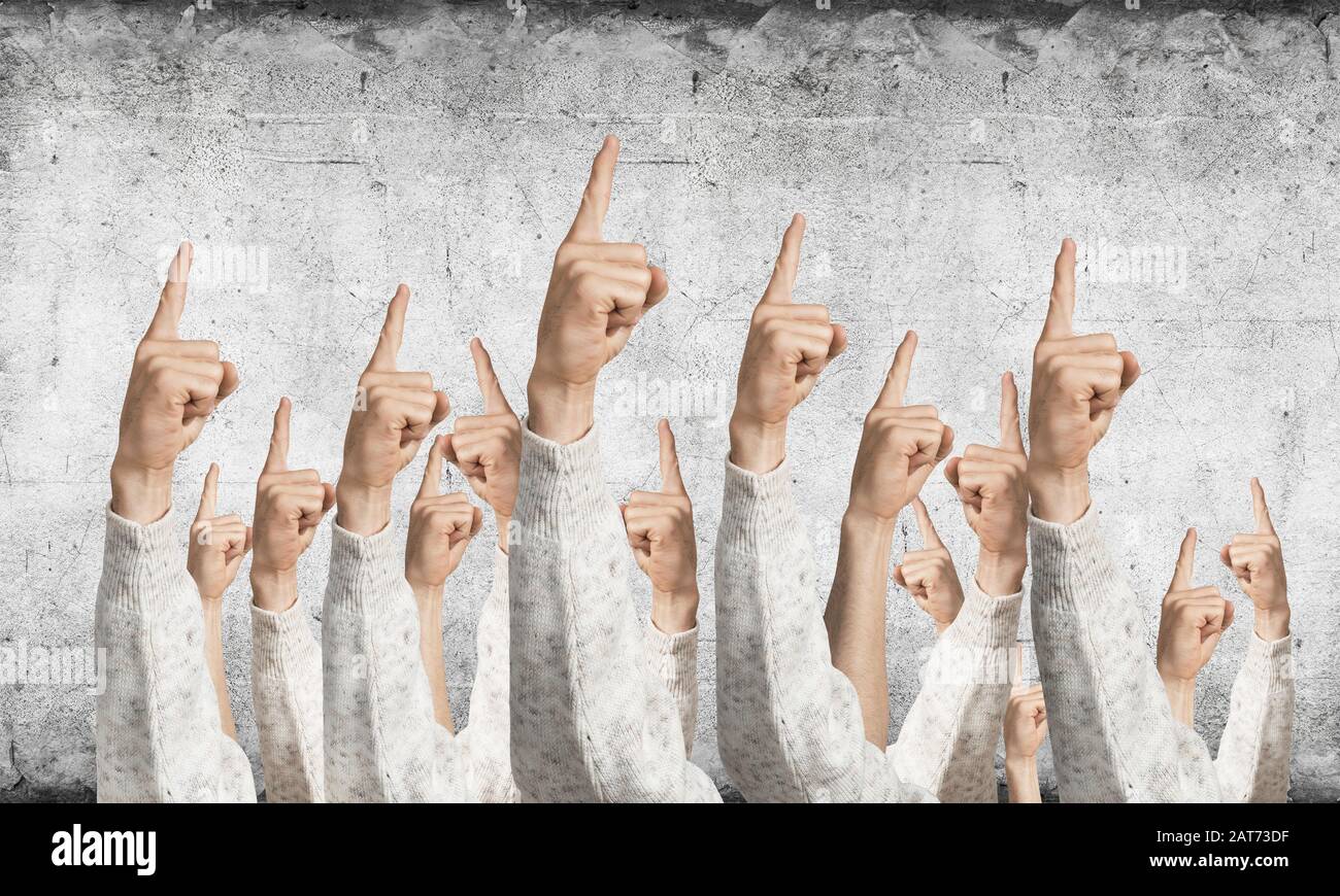 Row of man hands showing finger pointing gesture Stock Photo - Alamy