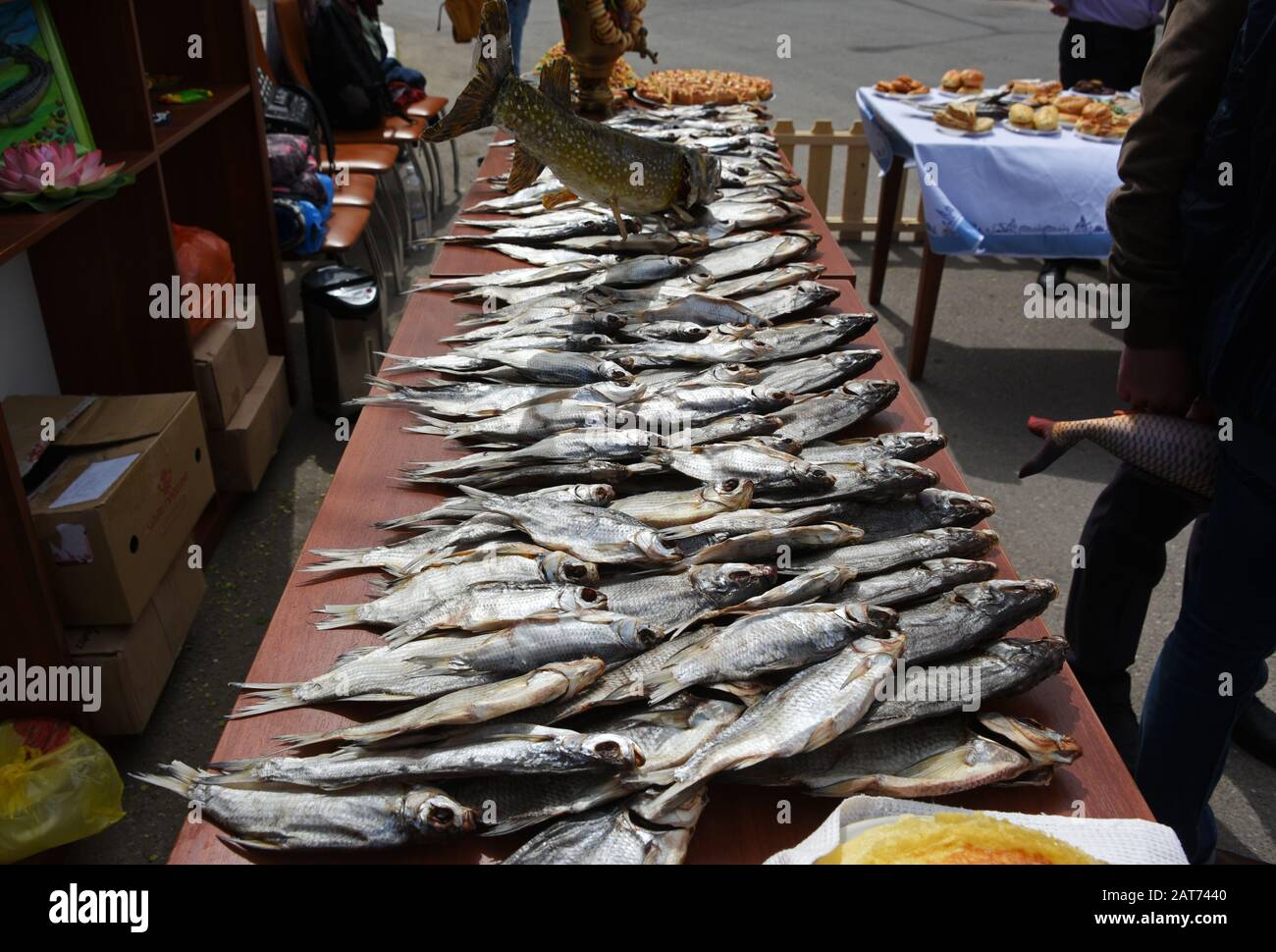 Dried freshwater fish "vobla" lying on the table Stock Photo - Alamy