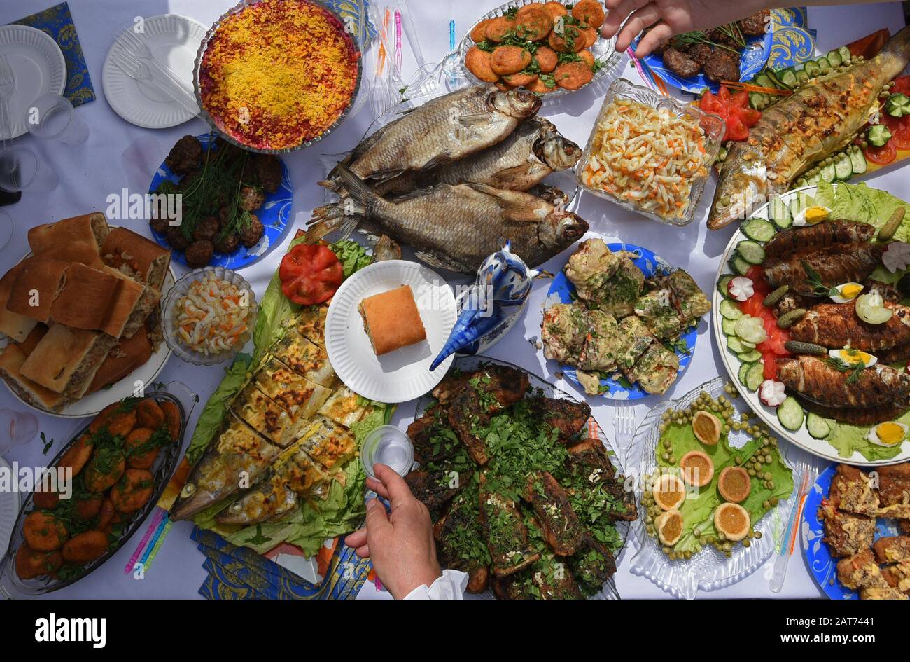 Table with various mix of fish dishes Stock Photo - Alamy