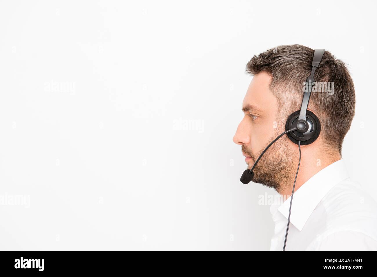 Side view portrait of handsome young man in headphones Stock Photo - Alamy