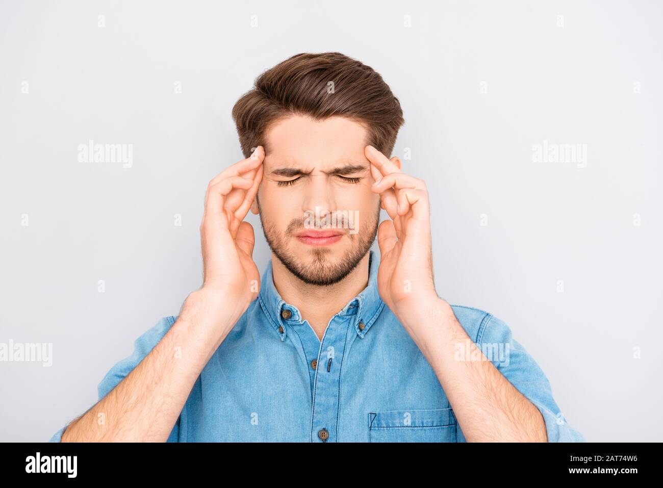 Portrait businessman strong headache hi-res stock photography and ...
