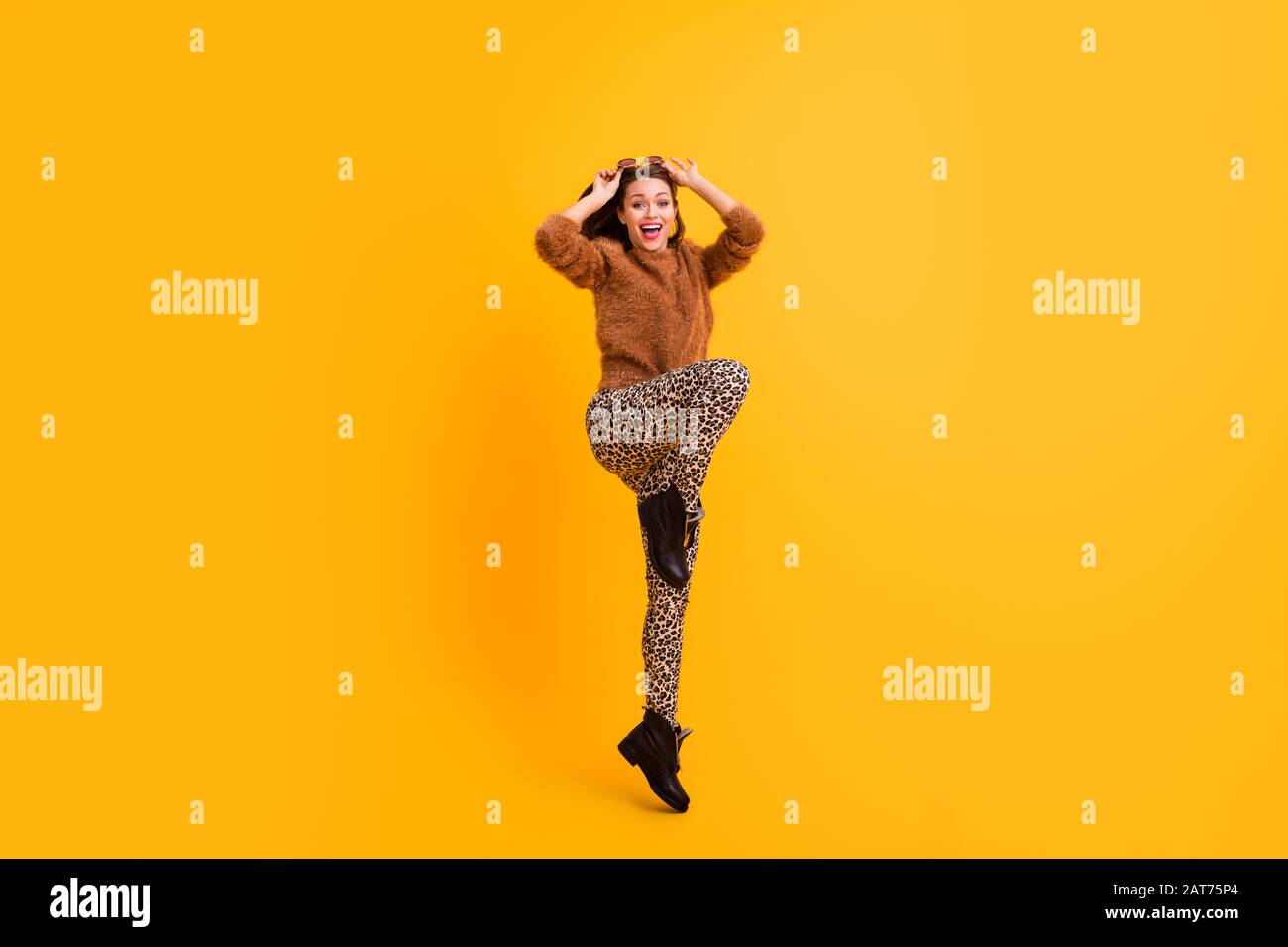 Full length photo of shocked lady jumping high nice youth look taking ...
