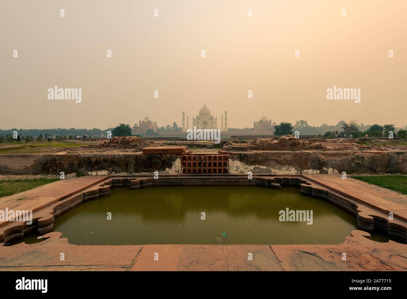 Wide shot of the backside of the Taj Mahal in Agra, India on overcast ...
