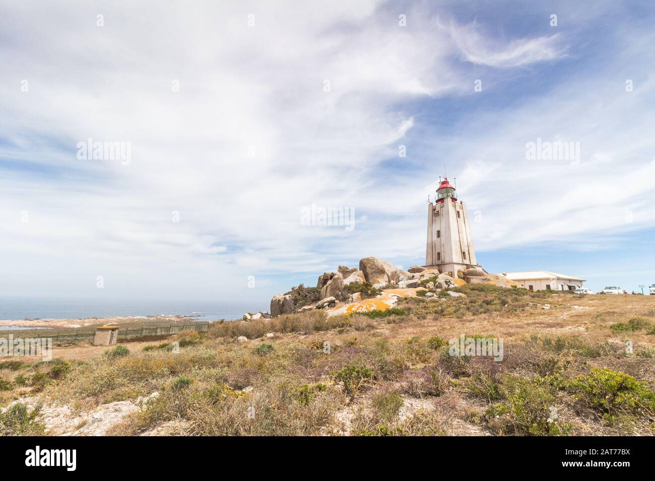Lighthouse overlooking the Atlantic Ocean on the West Coast of South ...
