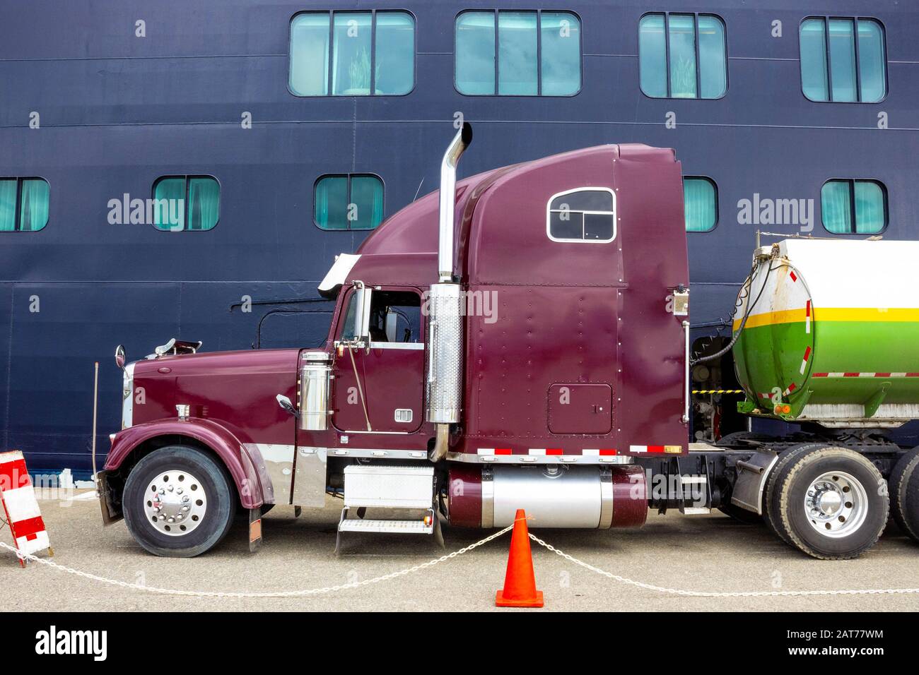 The truck cistern refueling a cruise ship docked at port at Costa Rica ...
