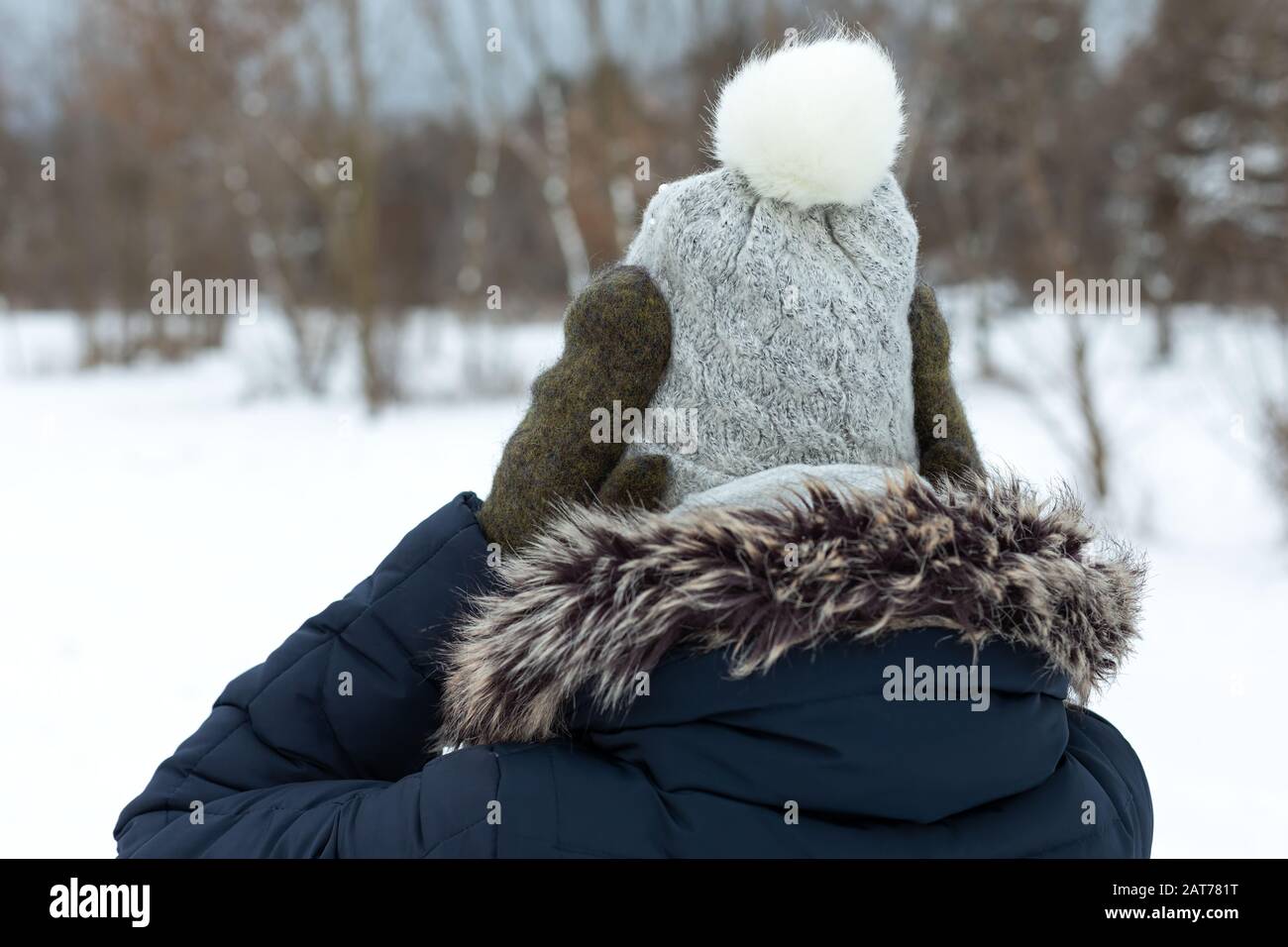 Happy young woman enjoying winter time outdoor Stock Photo - Alamy