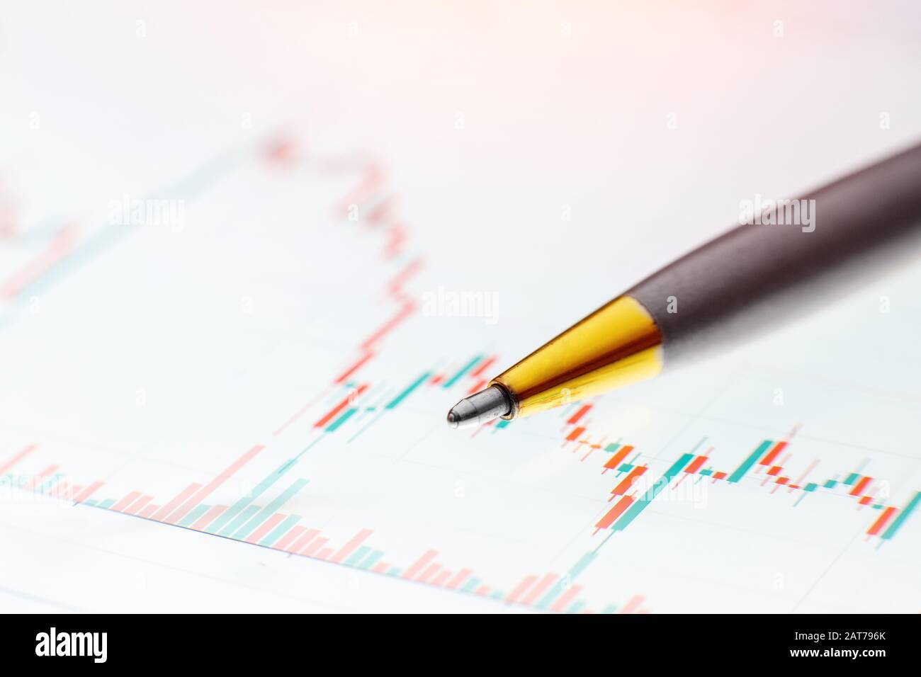 Concept Business and financial. Pen and charts of chart trade report ...