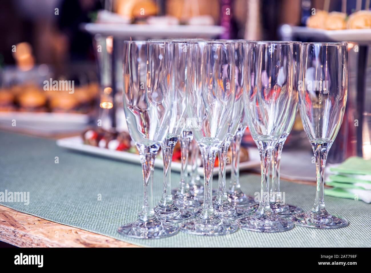 Catering service. Table setting, glass goblets, cutlery Stock Photo - Alamy
