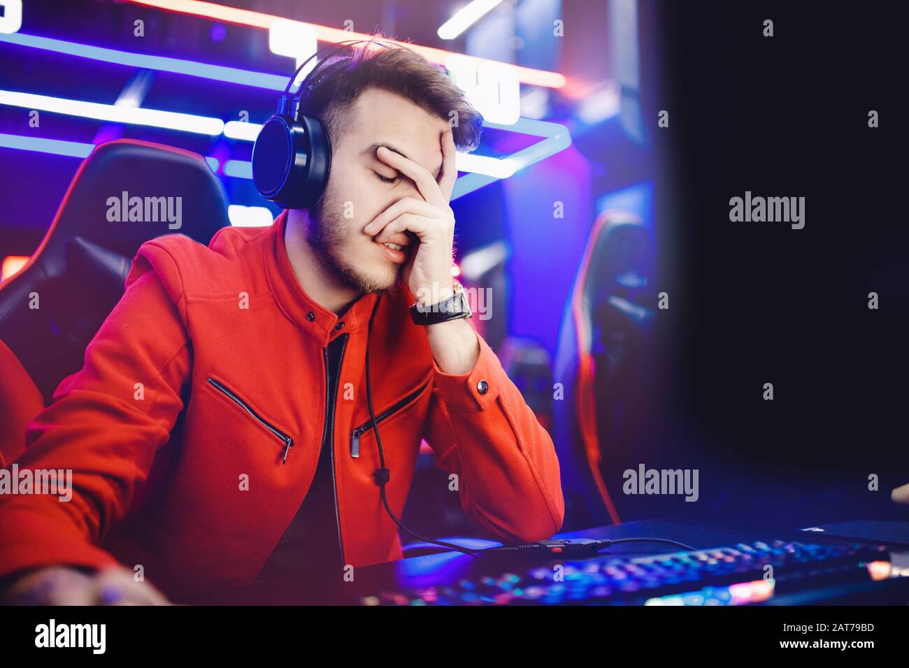 Streamer young man professional video gamer regrets loser playing ...