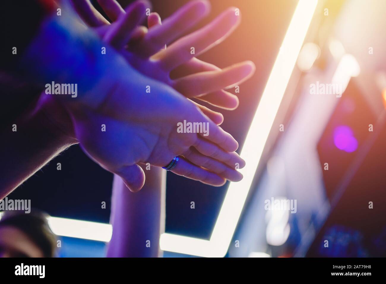 Team unity, athletes folded their hands on each other before cyber ...