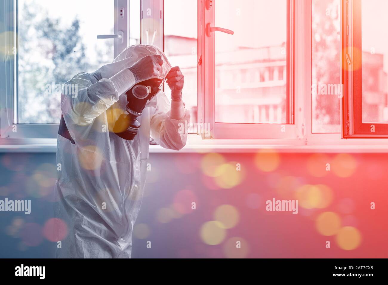 Man wearing protective biological suit and gas-mask due to mers ...
