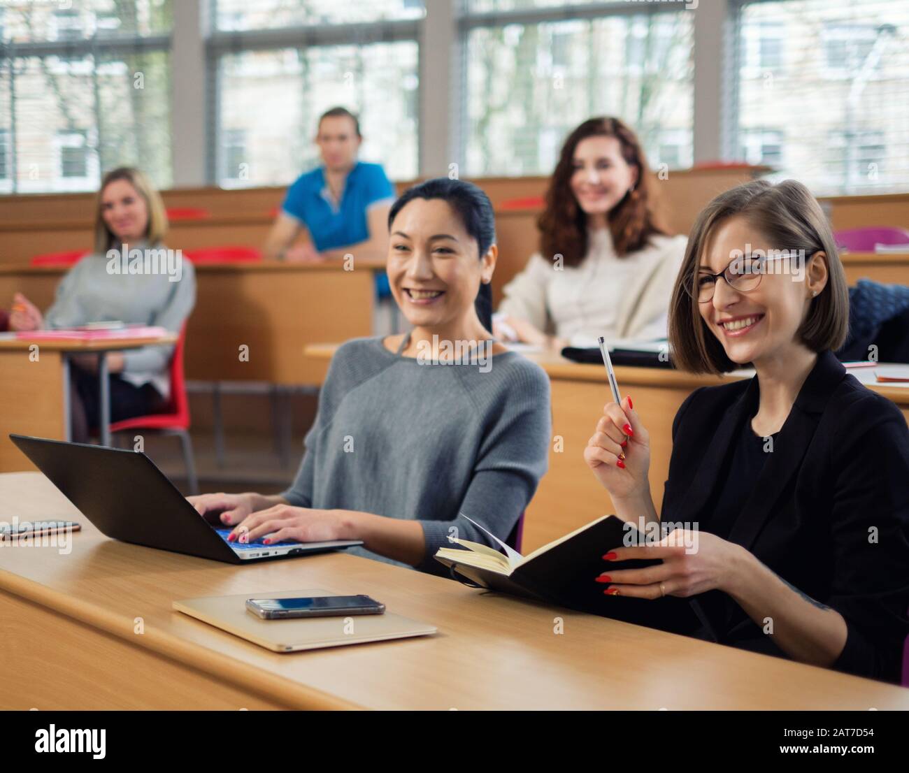Lecturer and multinational group of students in an auditorium Stock ...