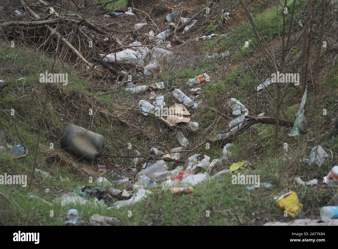 Symbol picture environmental pollution, plastic waste at the roadside ...