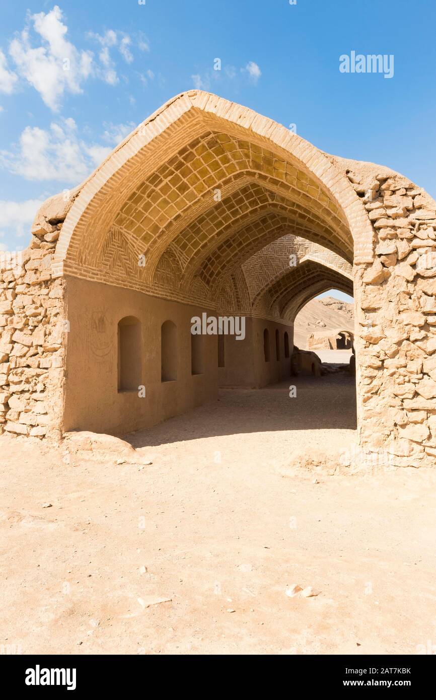 Ruins of ritual buildings near Dakhmeh Zoroastrian Tower of Silence ...