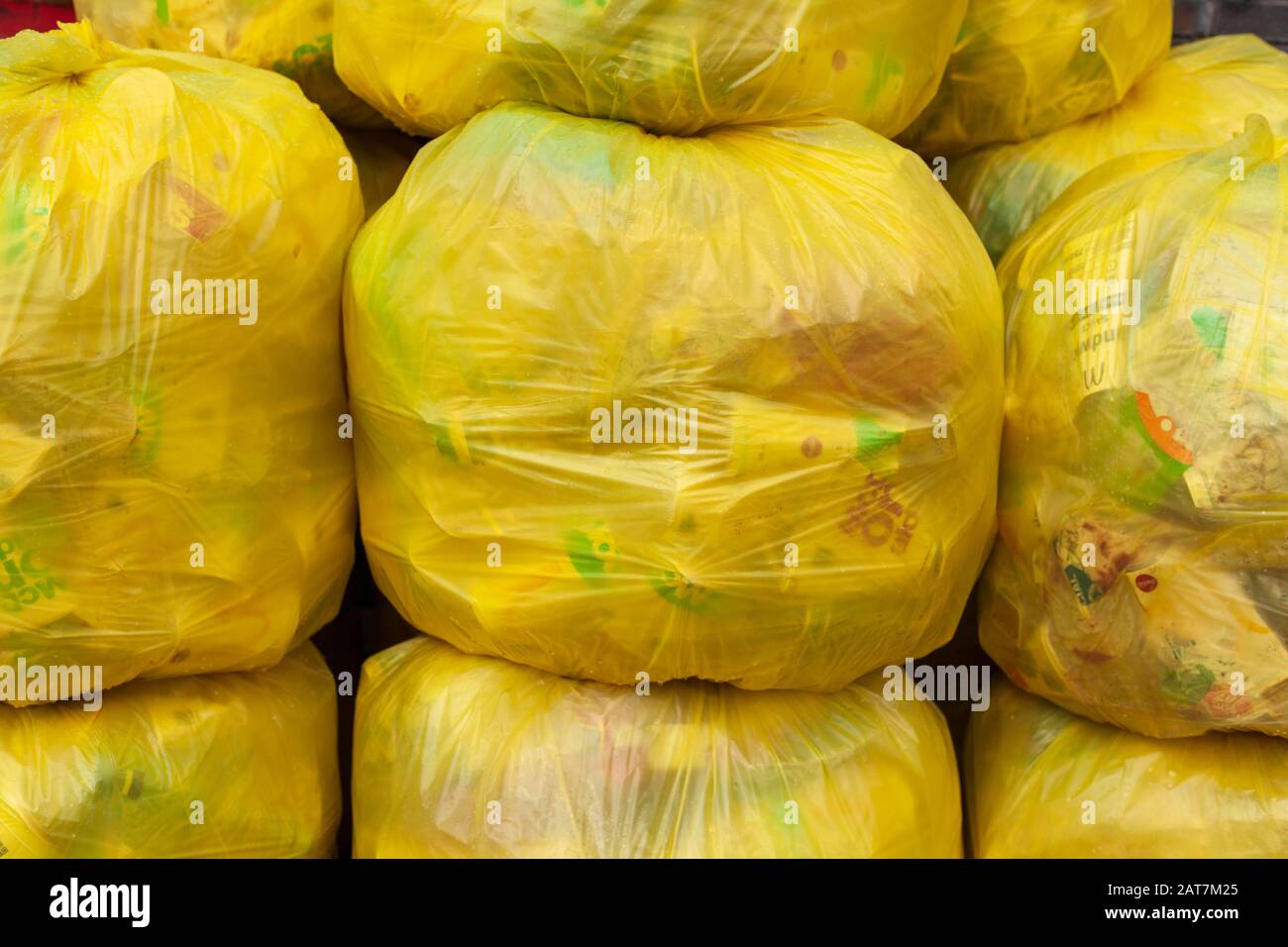 Stacked yellow bags for plastic waste, Bremen, Germany Stock Photo - Alamy