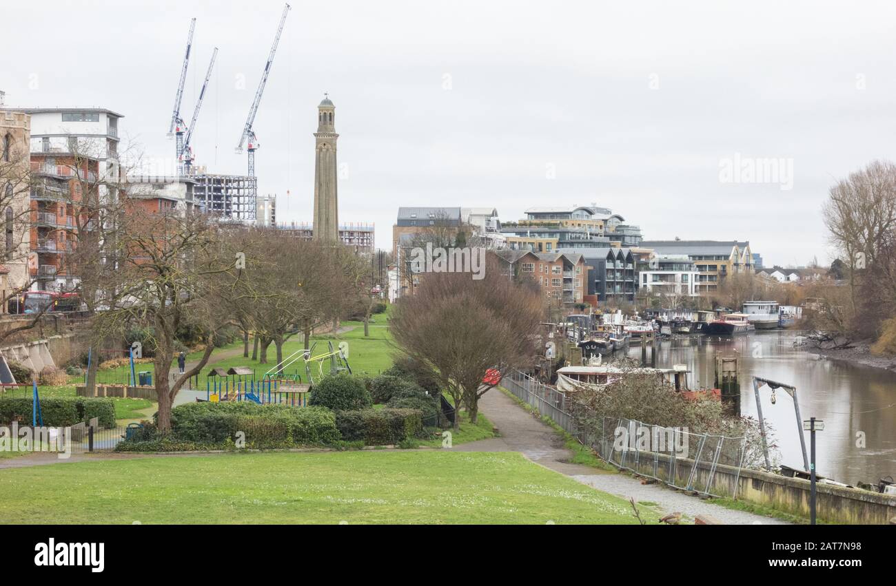Abandoned houseboats on the River Thames at Waterman's Park near Kew ...