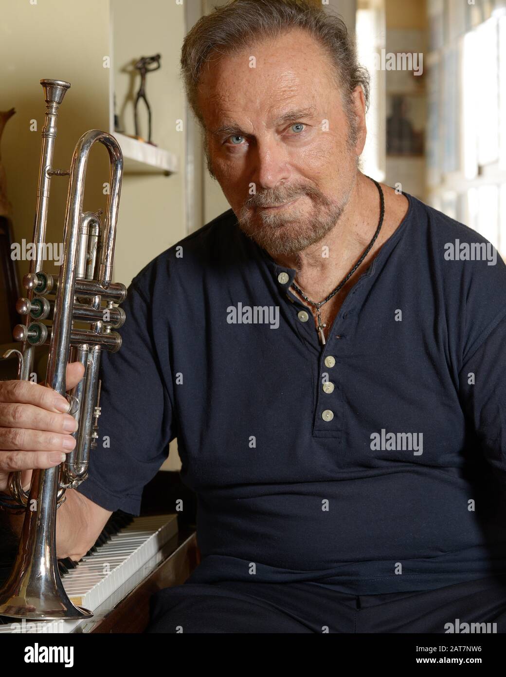 Portrait of the italian actor Franco Nero with a trumpet Photo © Sandro ...