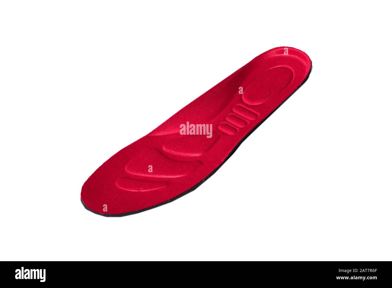 Red orthopedic insole on a white background Stock Photo - Alamy