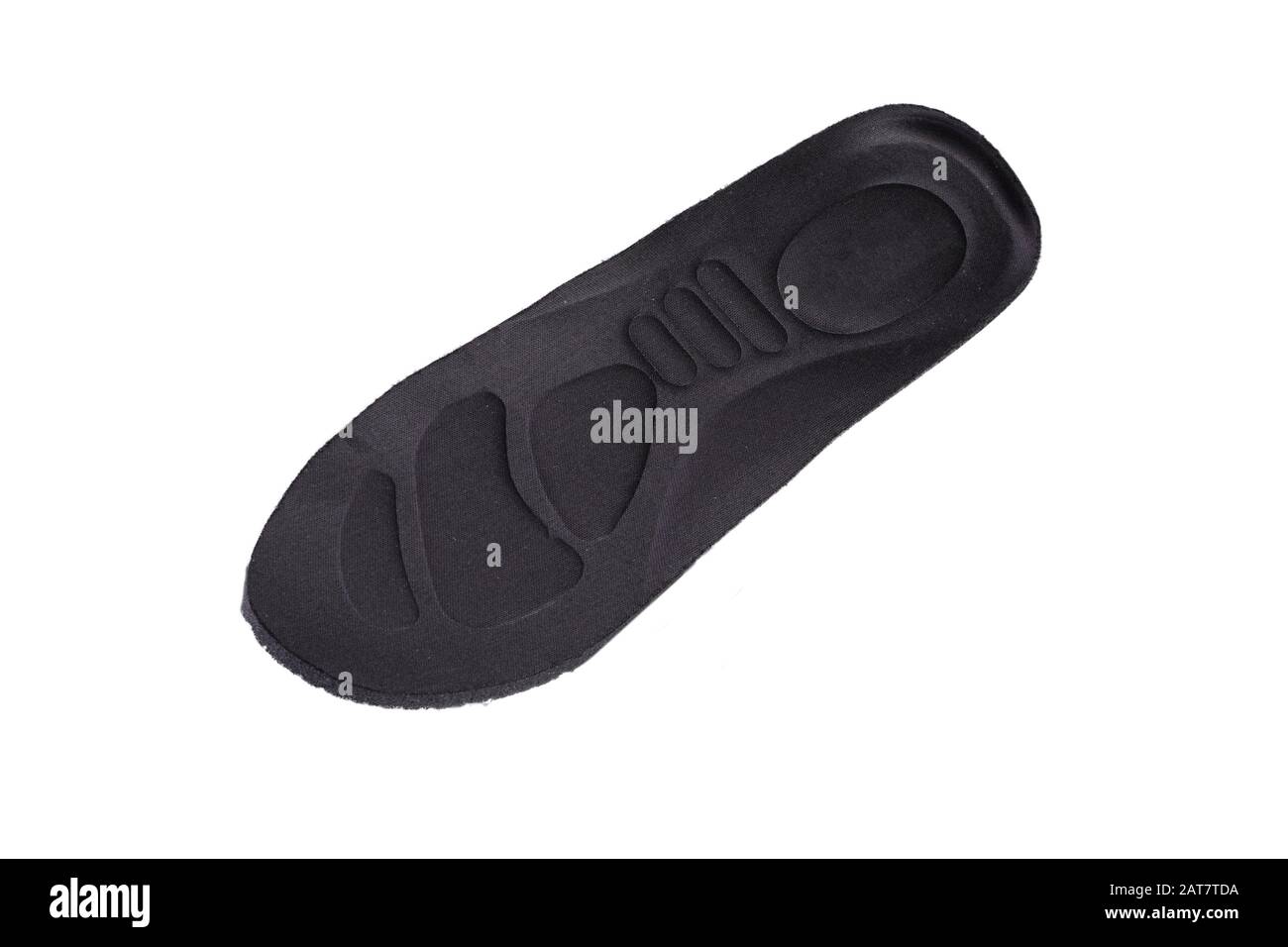 Black orthopedic insole on a white background Stock Photo - Alamy