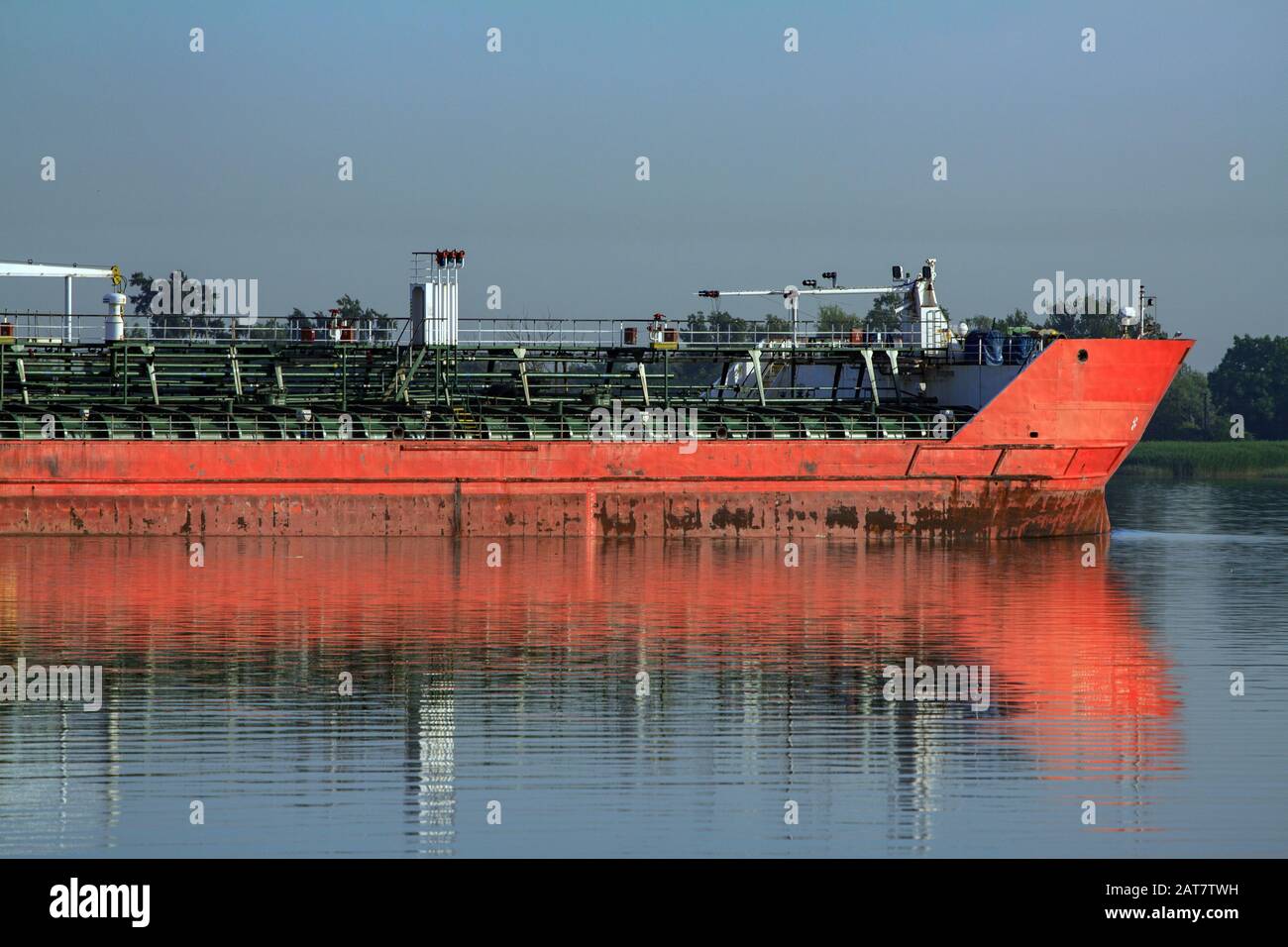 Large metal transport ship bulk carrier. A barge sailing with a cargo ...