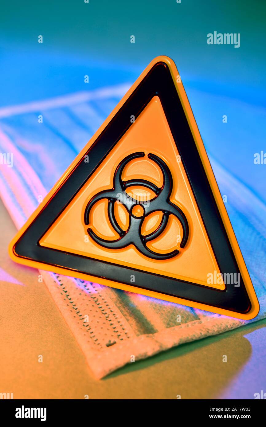 Biohazard sign on face mask, coronavirus outbreak Stock Photo - Alamy