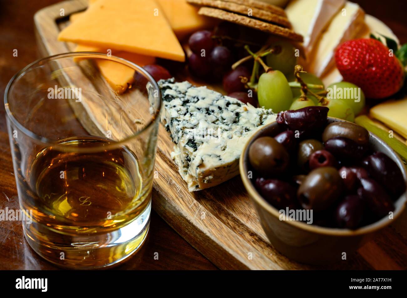 Tasting of original scottish cheese and whisky, plate with scottish ...