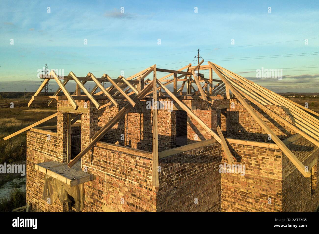 Private residential house with wooden roof frame structure under ...