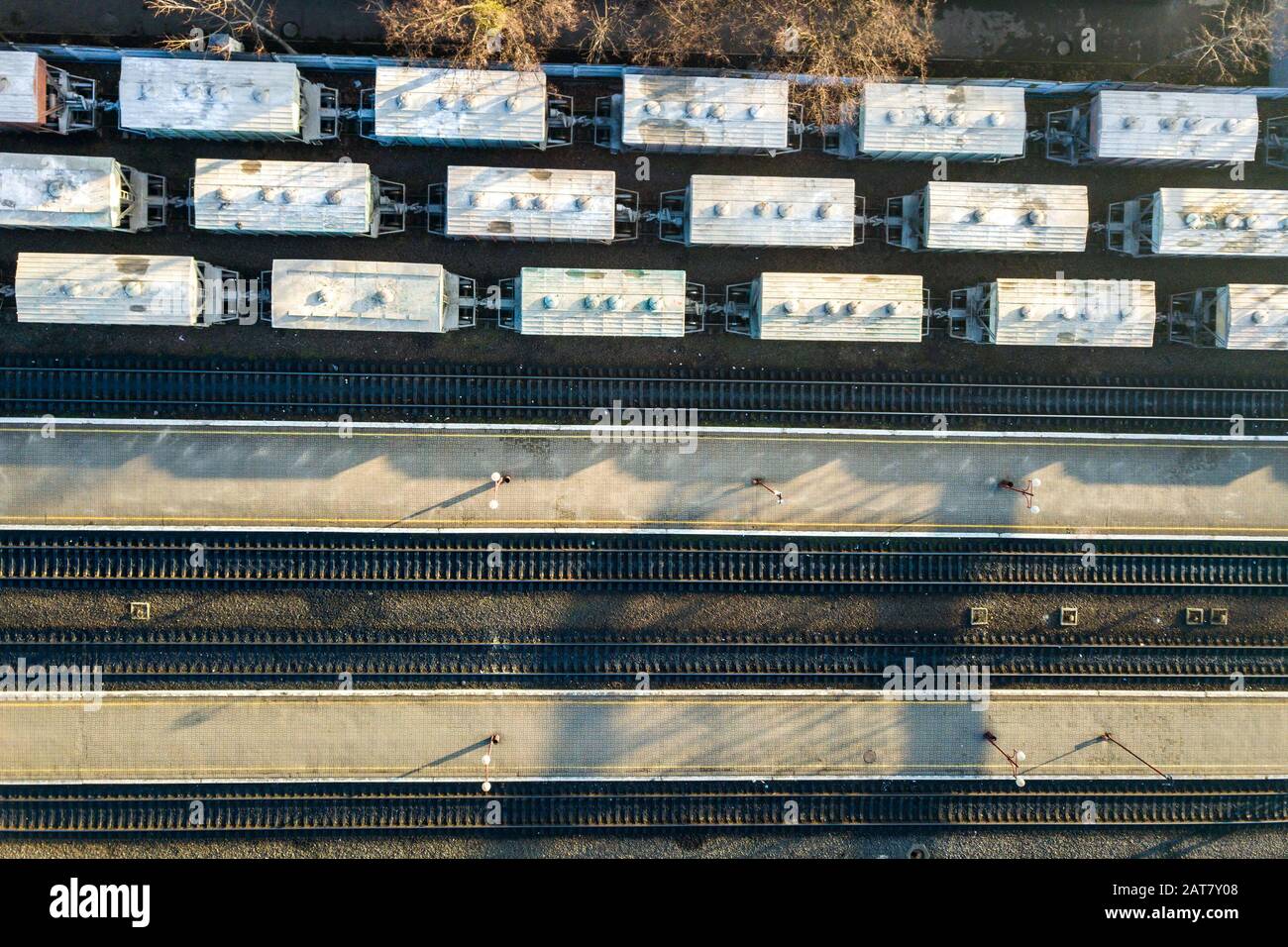 Top down aerial view of many cargo train cars on railway tracks Stock ...