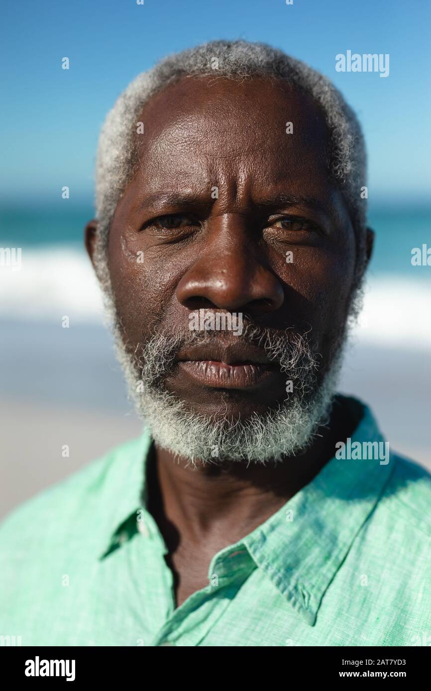 Old man looking at the camera Stock Photo - Alamy