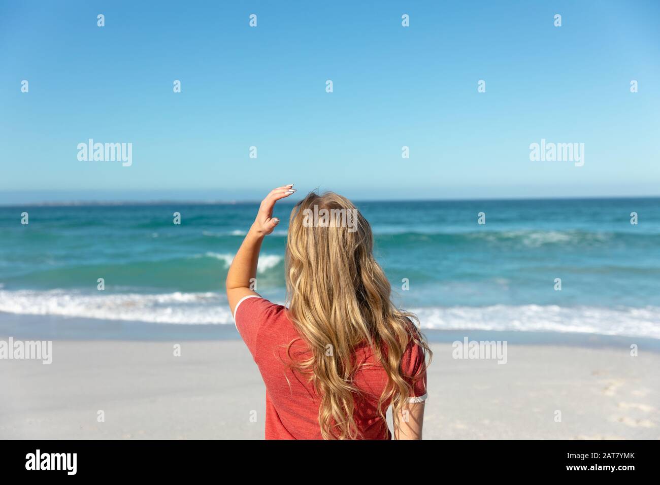 Rear view fun young woman beach hi-res stock photography and images - Alamy