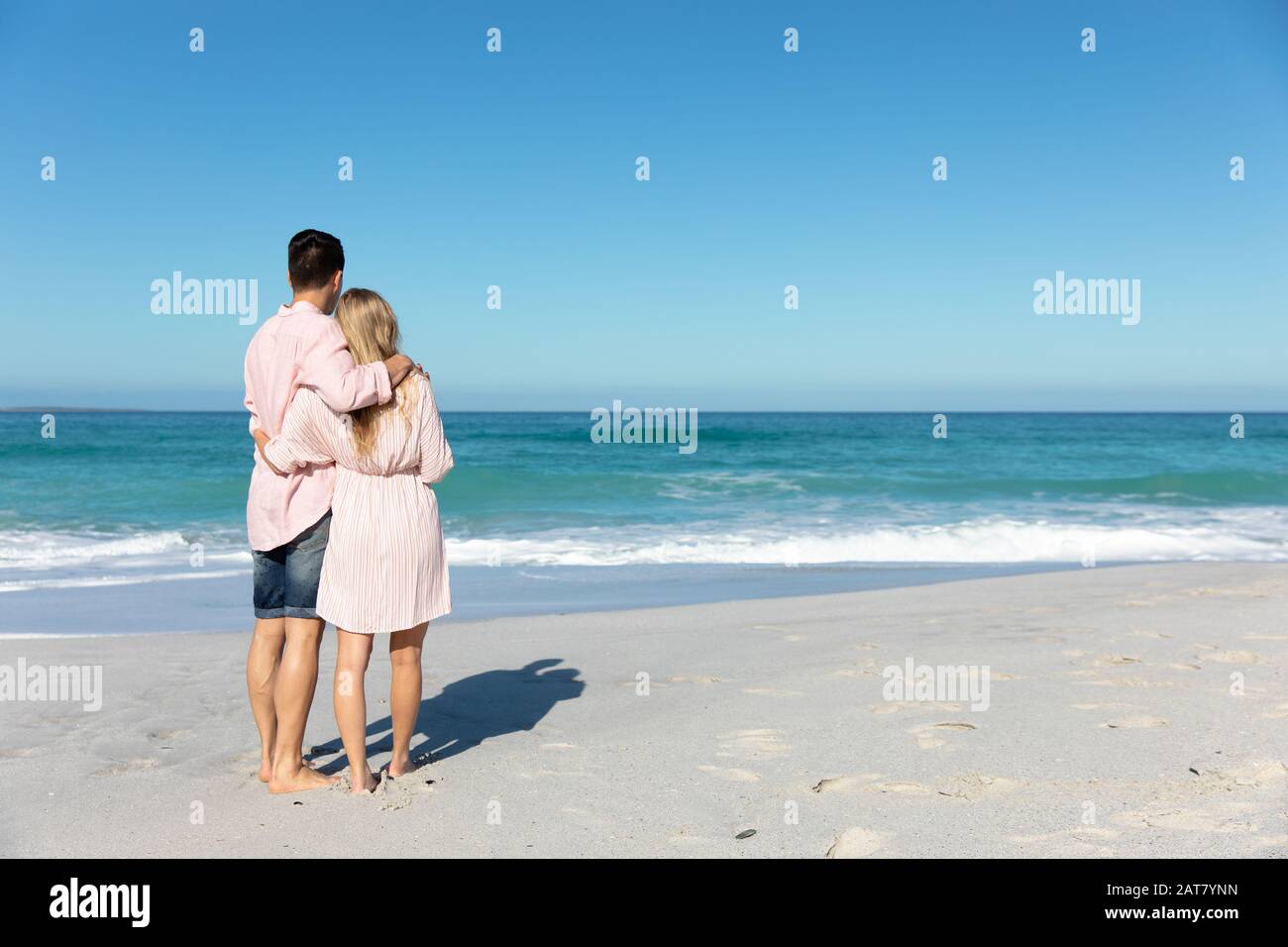 Rear view of young couple enjoying free time Stock Photo - Alamy Rear view of young couple enjoying free time Stock Photo - Alamy