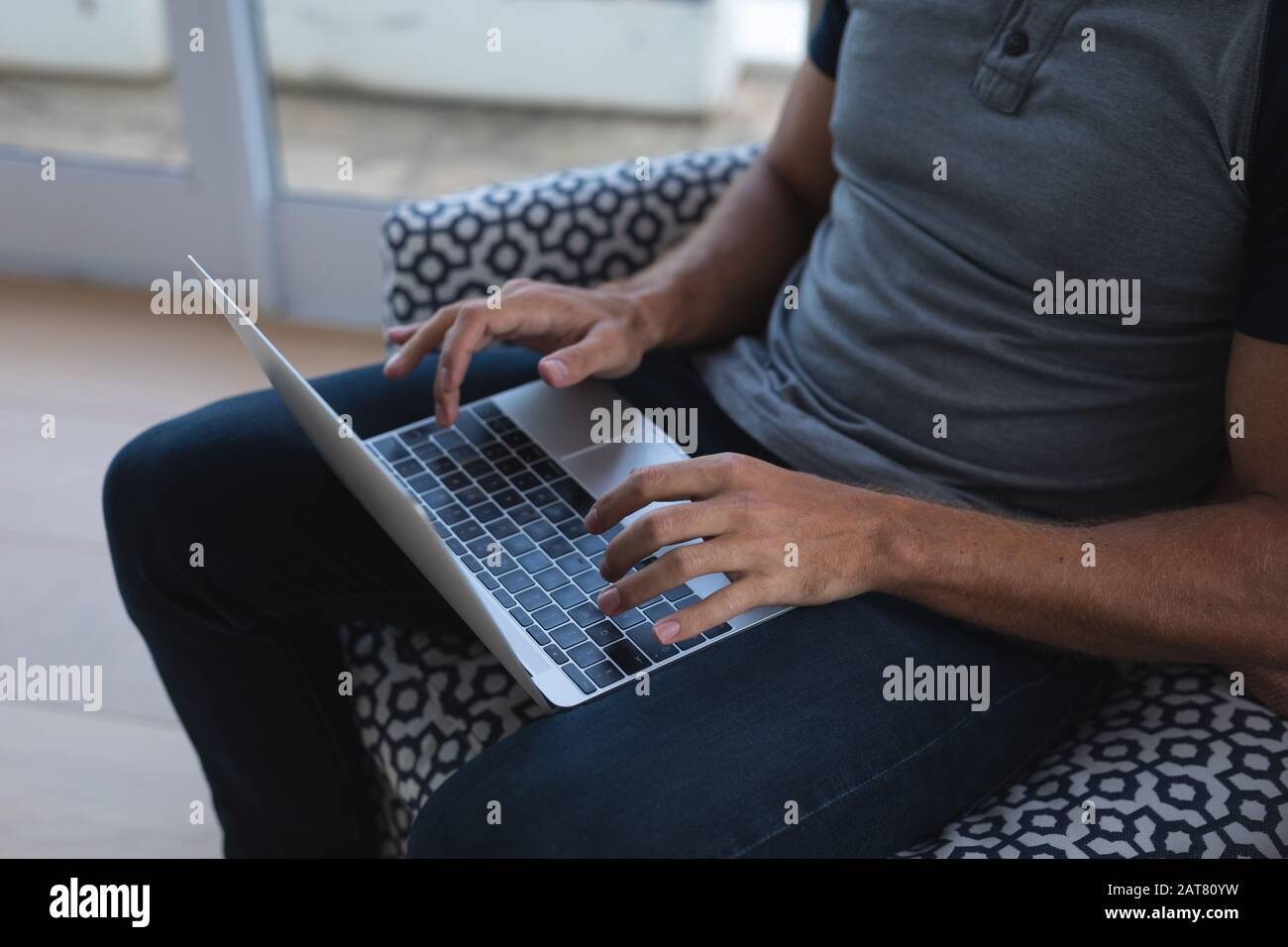 Using computer at home hi-res stock photography and images - Alamy
